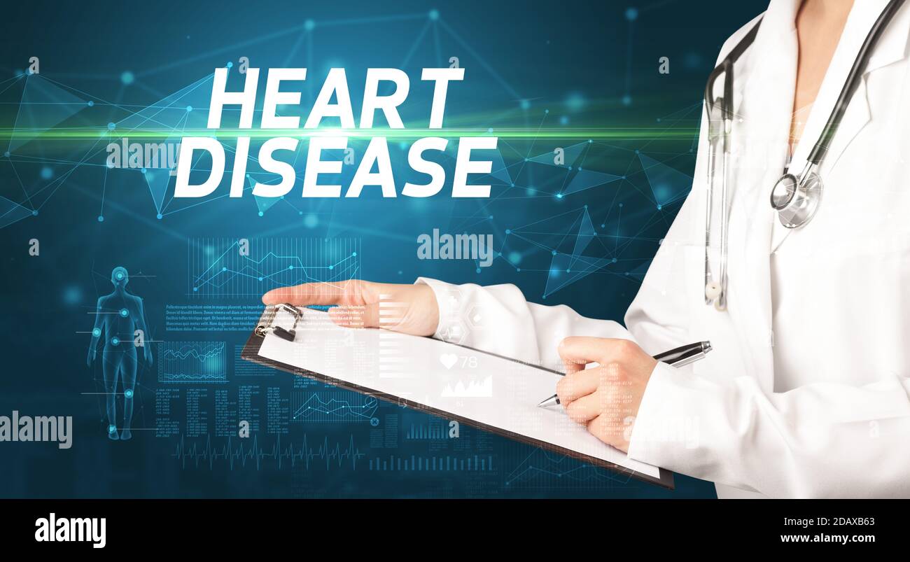 doctor writes notes on the clipboard with HEART DISEASE inscription ...