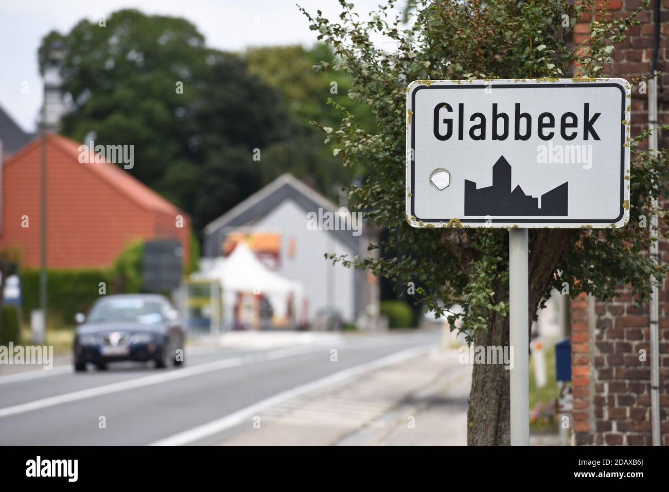 Illustration shows the name of the Glabbeek municipality on a road sign ...