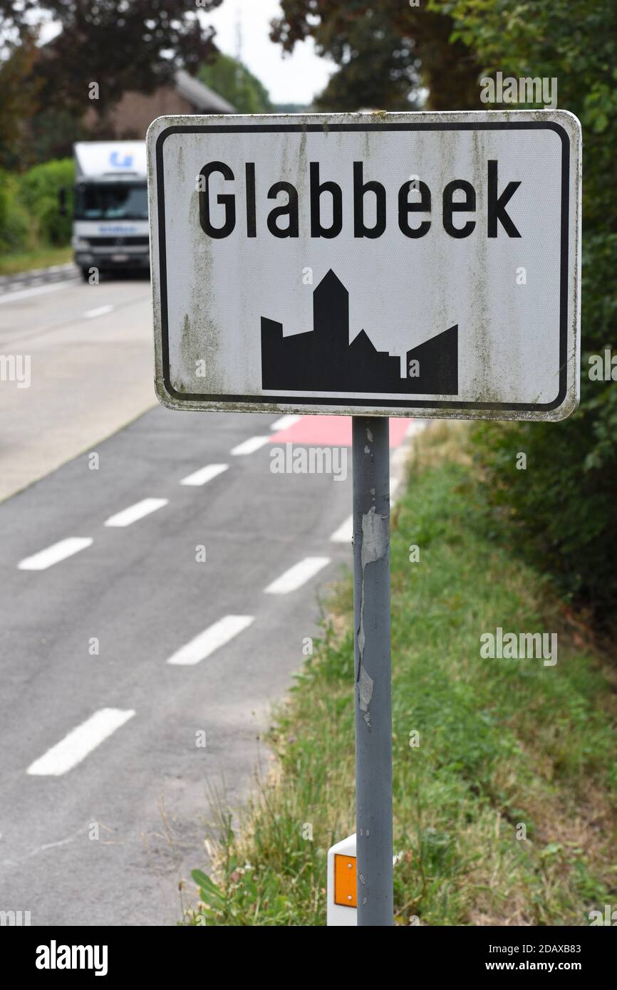 Illustration shows the name of the Glabbeek municipality on a road sign ...