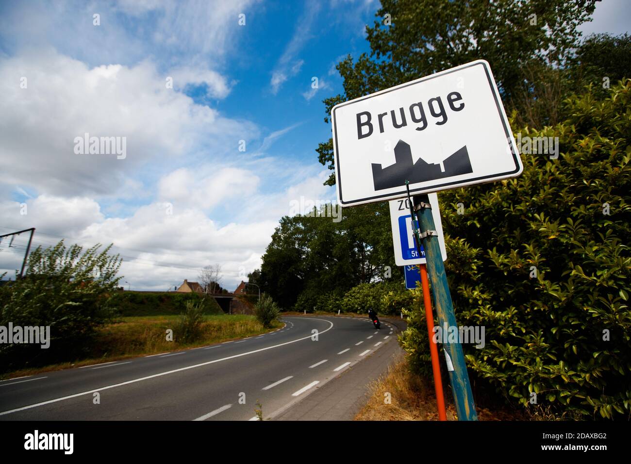 Illustration shows the name of the Brugge municipality on a road sign ...