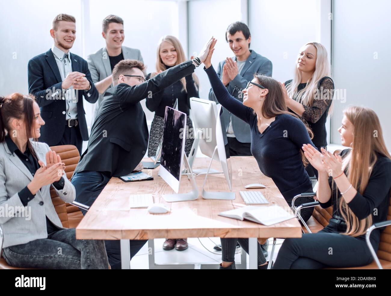 happy business team showing their success in the workplace Stock Photo ...