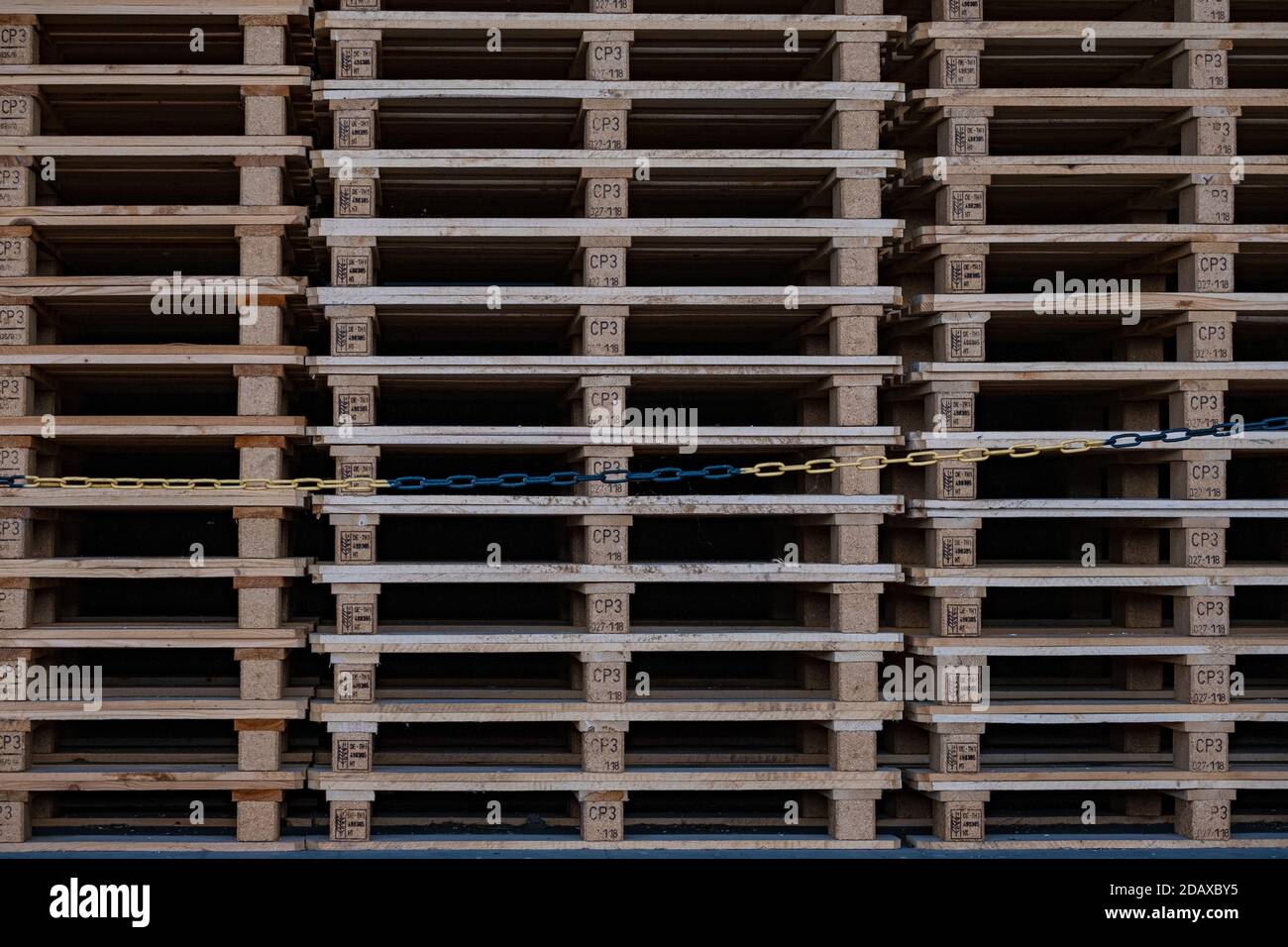 wooden pallets accurately stacked Stock Photo - Alamy