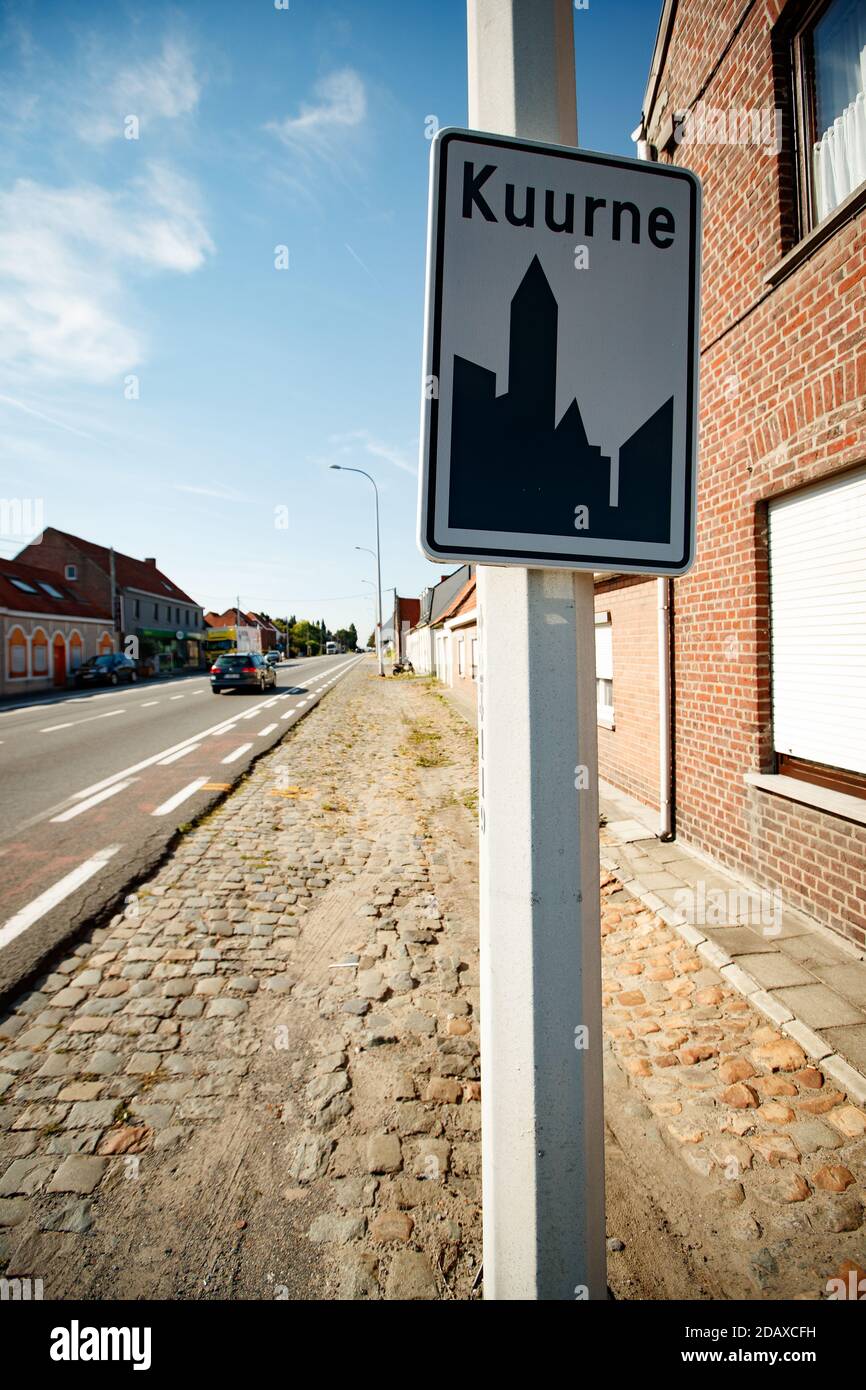 Illustration shows the name of the Kuurne municipality on a road sign ...