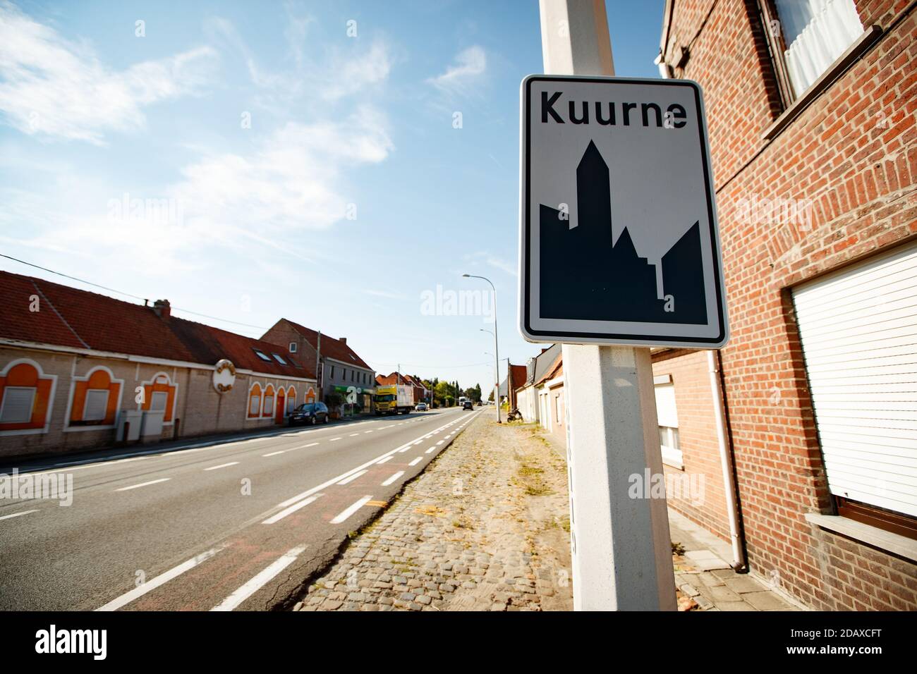 Illustration shows the name of the Kuurne municipality on a road sign ...