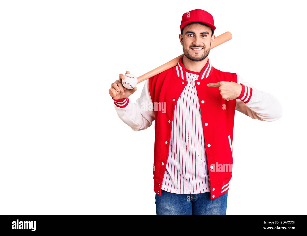 Young handsome man holding baseball bat and ball pointing finger to one ...
