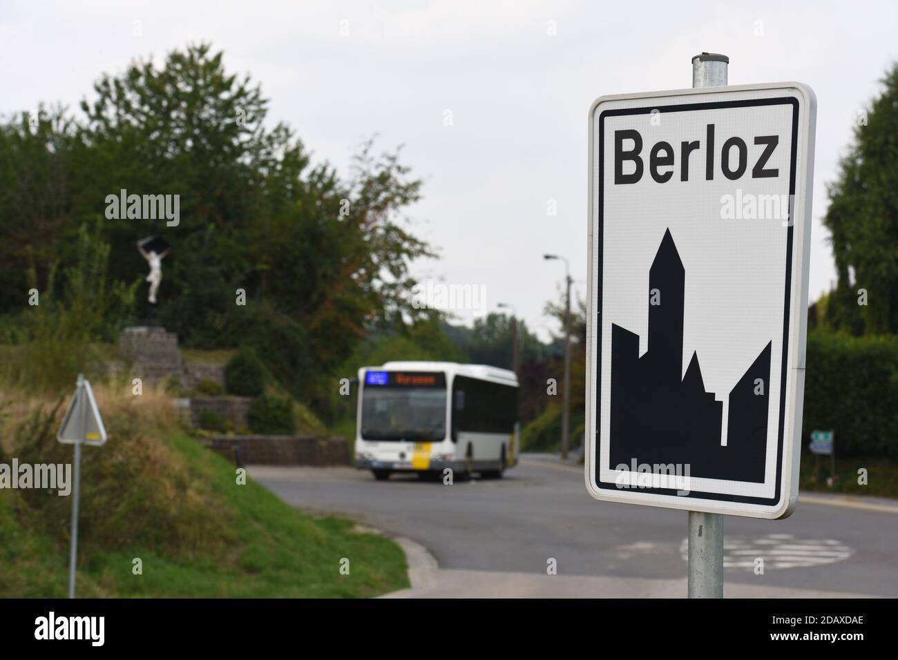 Illustration shows the name of the Berloz municipality on a road sign ...