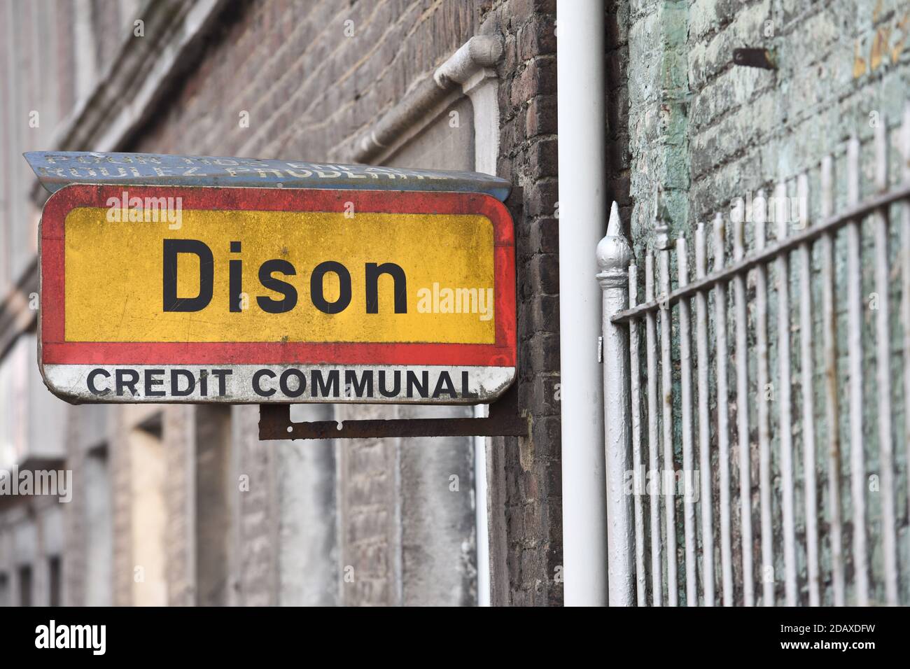 Illustration shows the name of the Dison municipality on a road sign ...