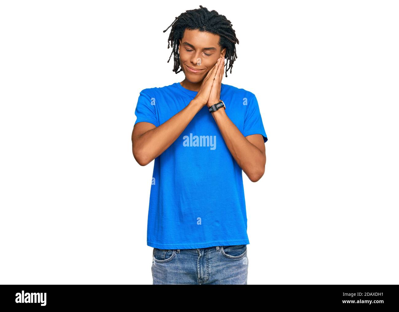 Young african american man wearing casual clothes sleeping tired ...