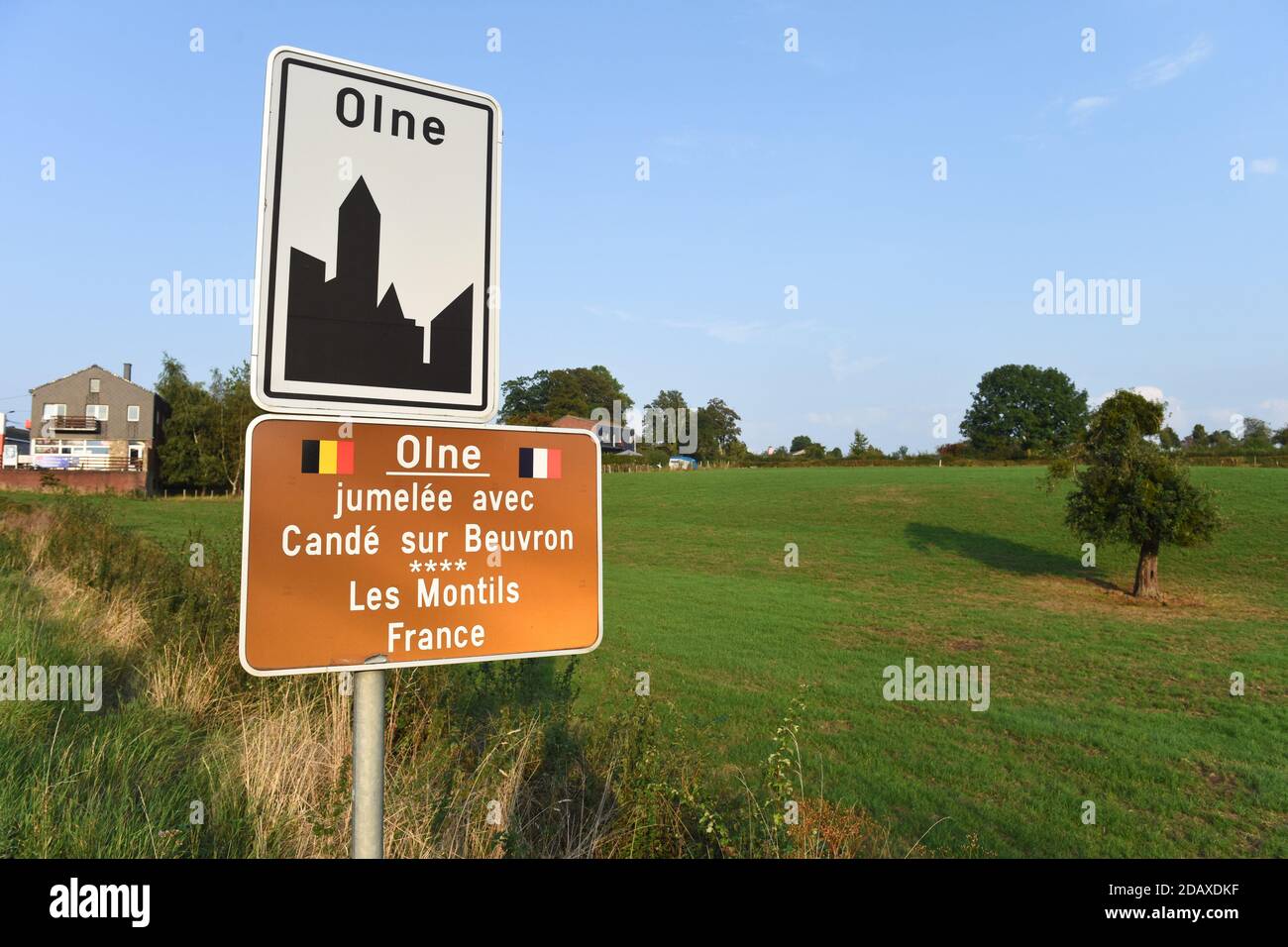 Illustration shows the name of the Olne municipality on a road sign ...