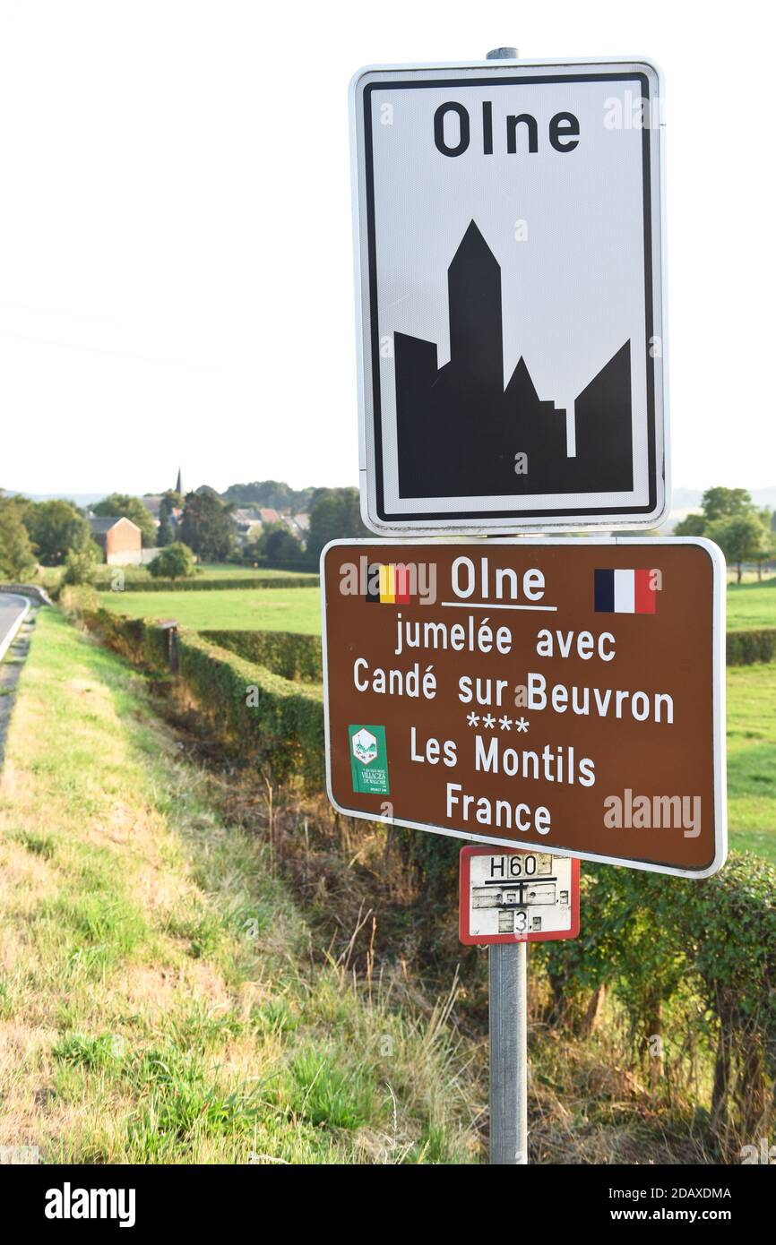 Illustration shows the name of the Olne municipality on a road sign ...