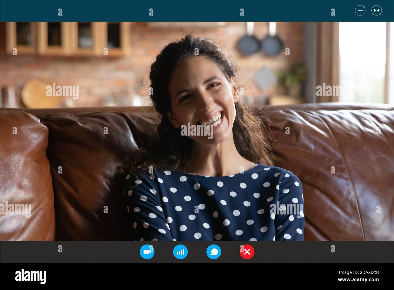 Happy young woman enjoying pleasant talk with friends Stock Photo - Alamy