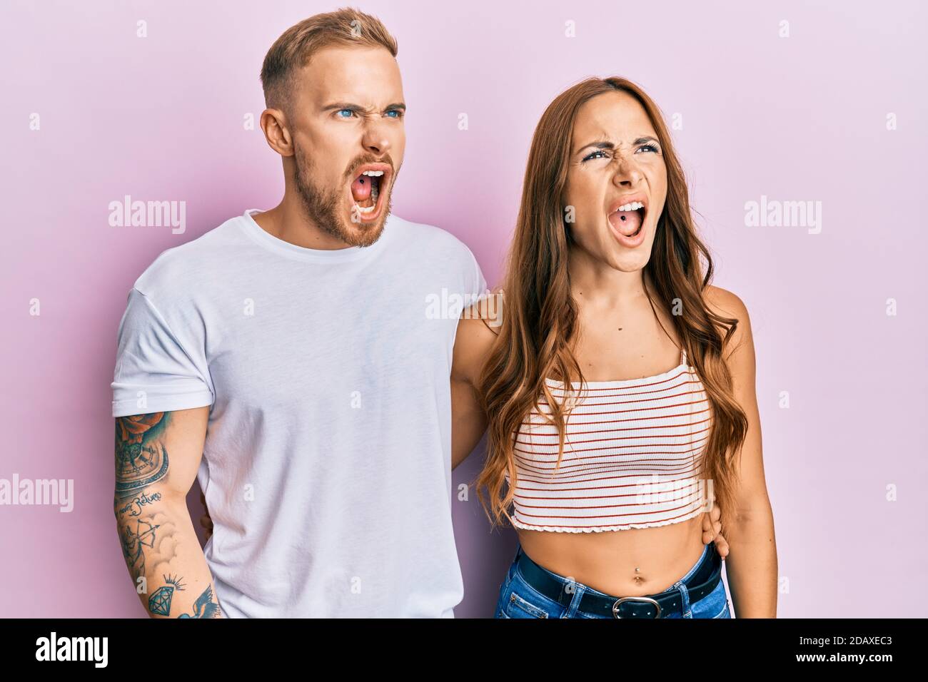 Young couple of girlfriend and boyfriend hugging and standing together ...