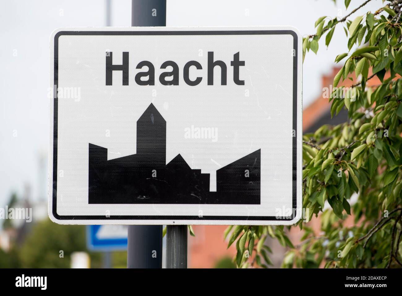 Illustration shows the name of the Haacht municipality on a road sign ...