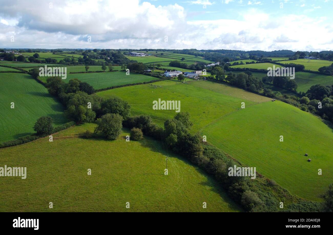 An aerial view of a small lake nestled in the Devon countryside Stock ...