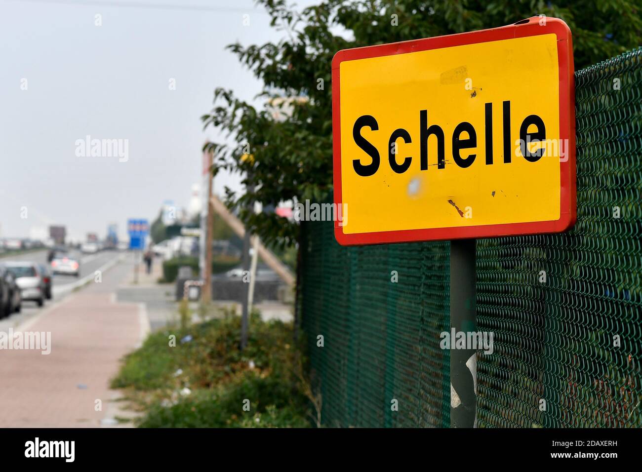 Illustration shows the name of the Schelle municipality on a road sign ...