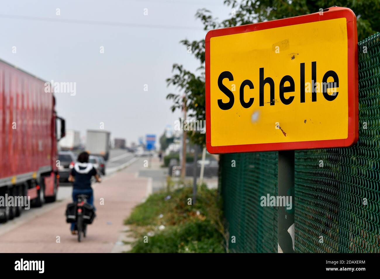 Illustration shows the name of the Schelle municipality on a road sign ...