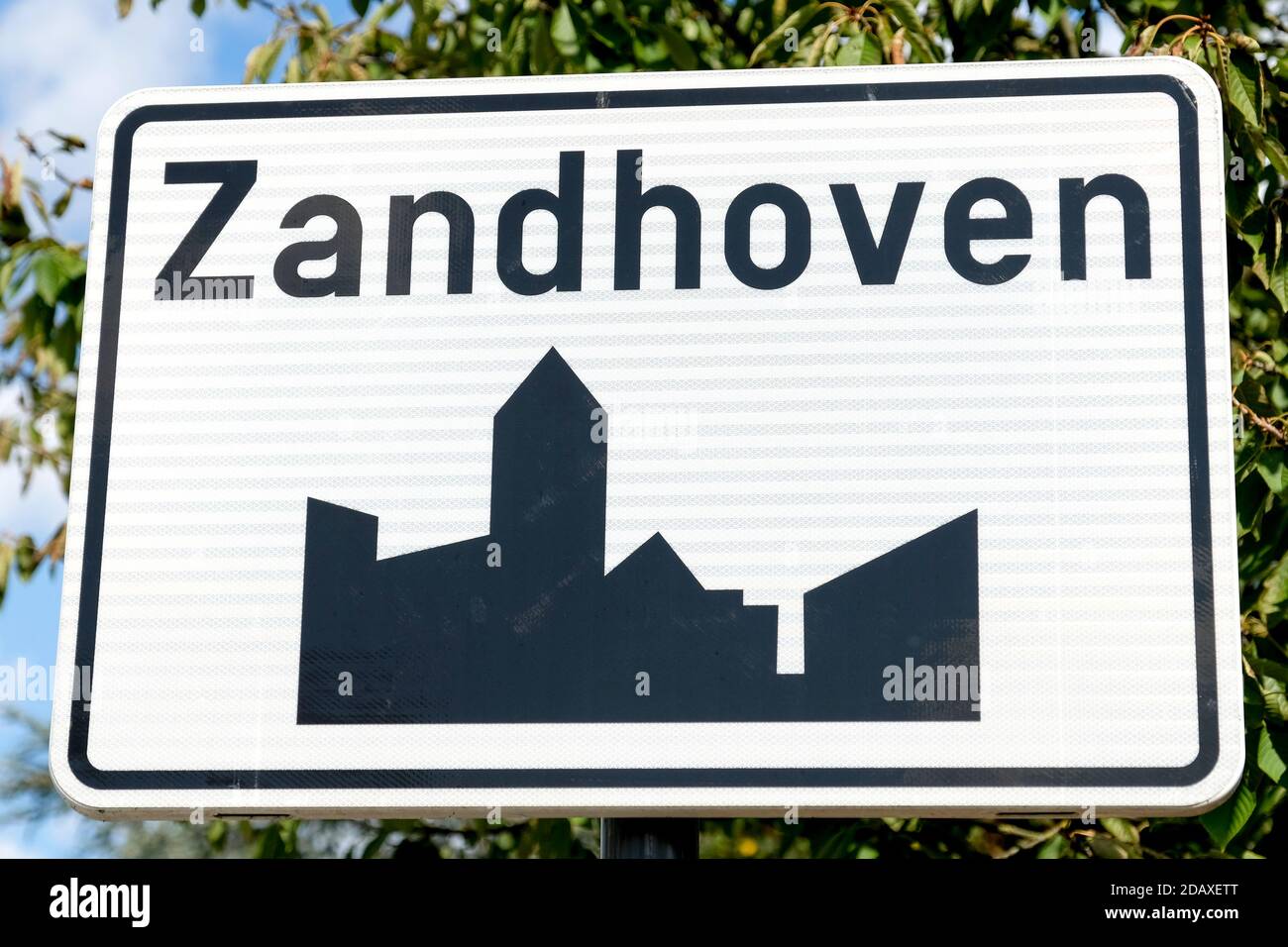 Illustration shows the name of the Zandhoven municipality on a road ...