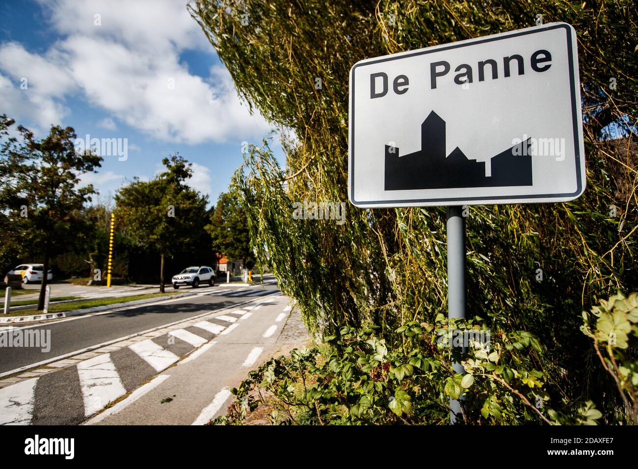 Illustration shows the name of the De Panne municipality on a road sign ...