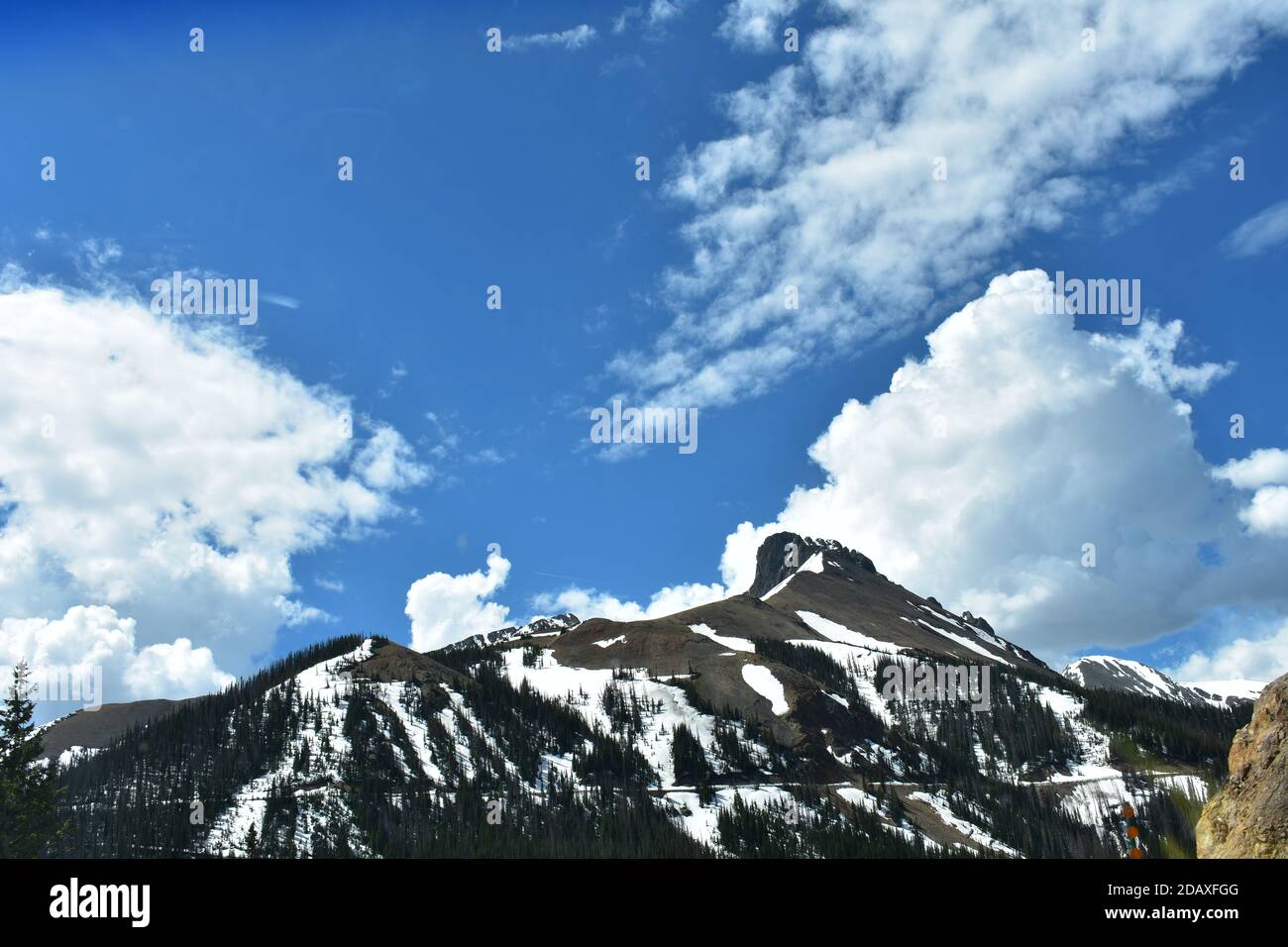 Snow capped mountains with blue sky. Colorado Rocky Mountains Stock ...