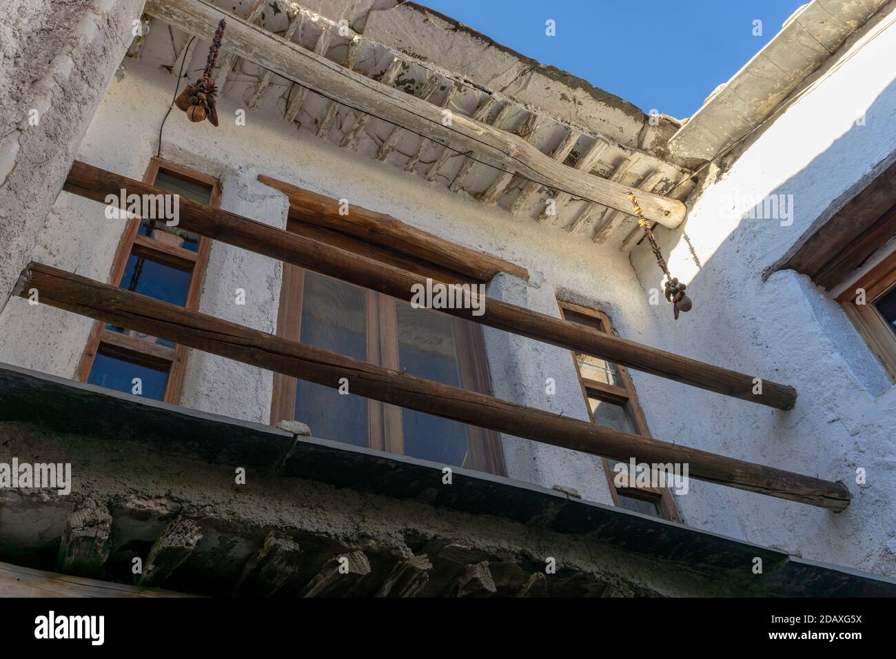 balcony of old house with wooden railing Stock Photo - Alamy