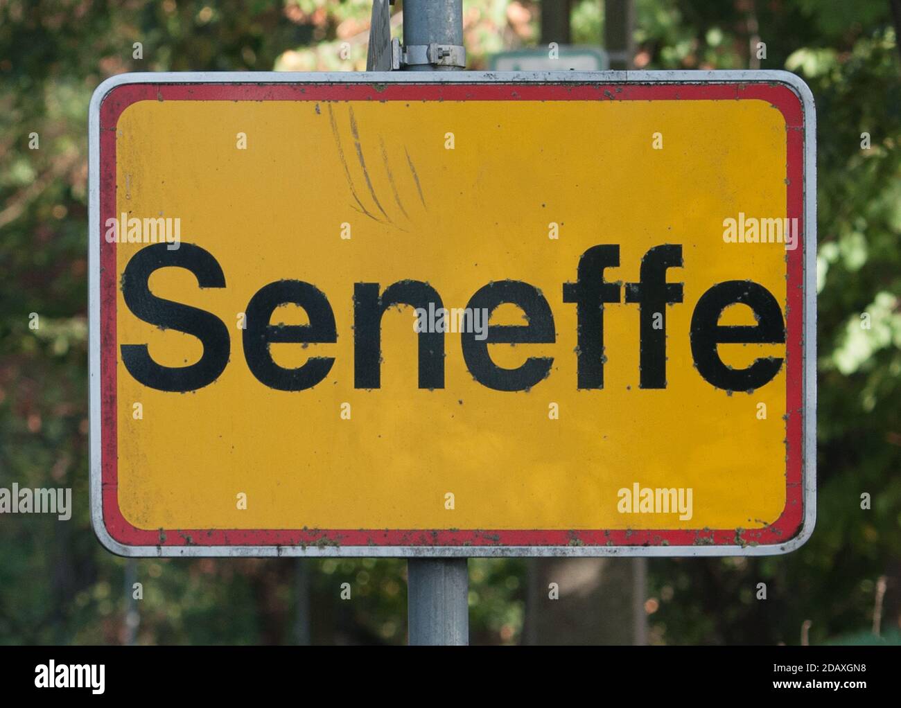 Illustration shows the name of the Seneffe municipality on a road sign ...