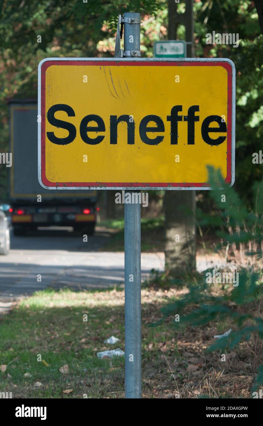 Illustration shows the name of the Seneffe municipality on a road sign ...