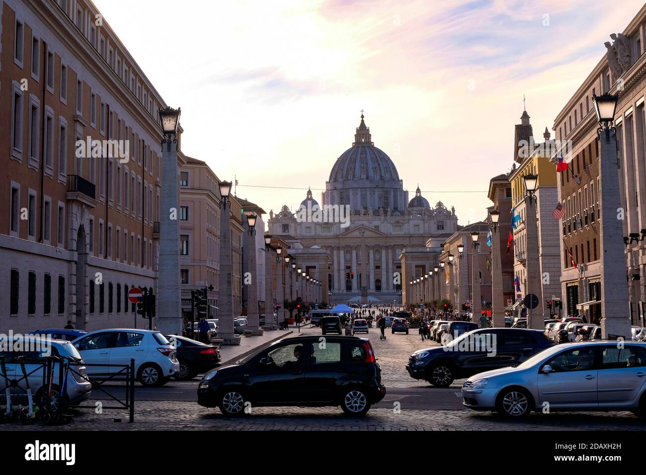 Saint Peter Basilica and Vatican City with Car Traffic in Front During ...