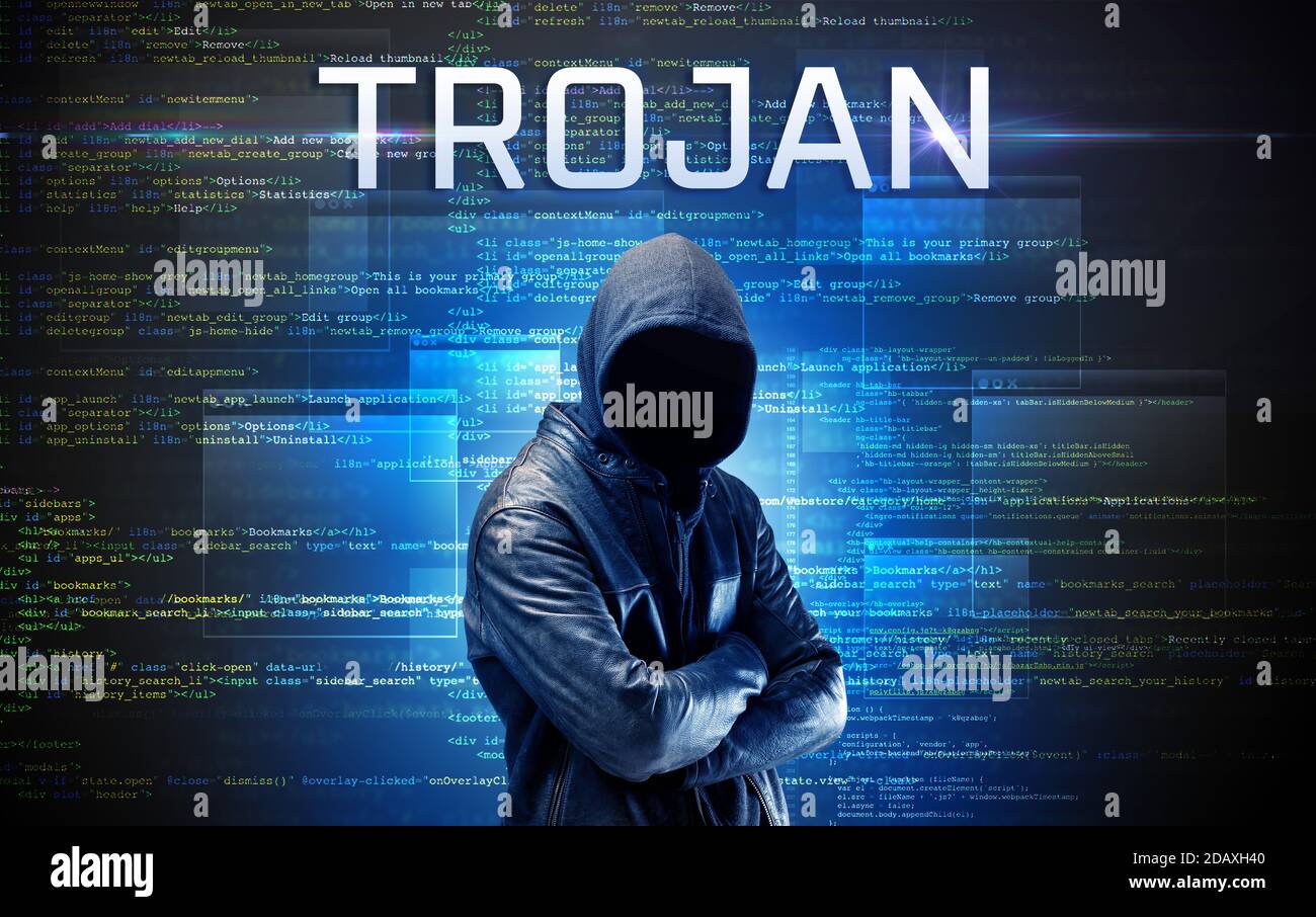 Faceless hacker with TROJAN inscription on a binary code background ...