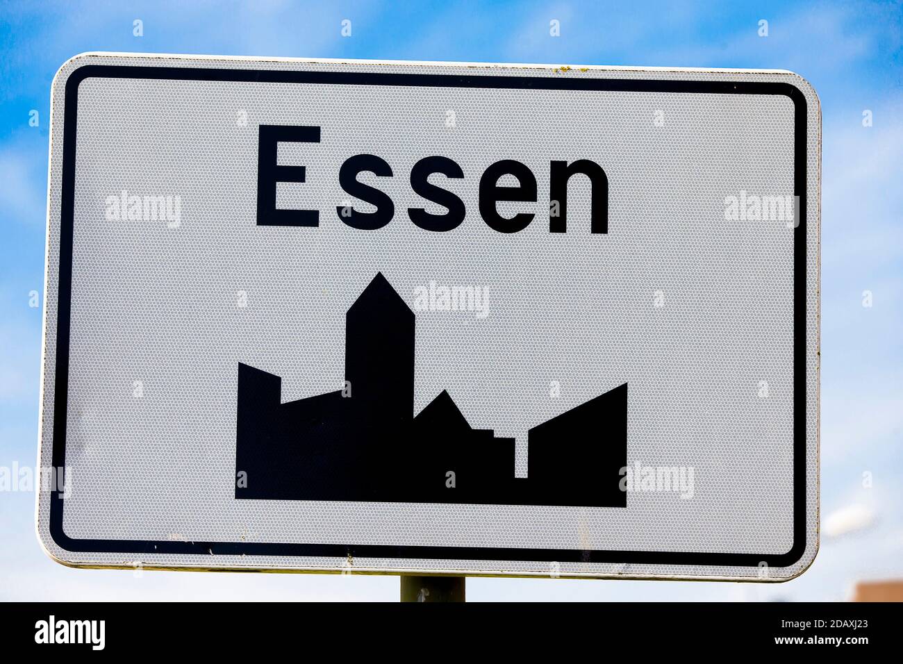Illustration shows the name of the Essen municipality on a road sign ...