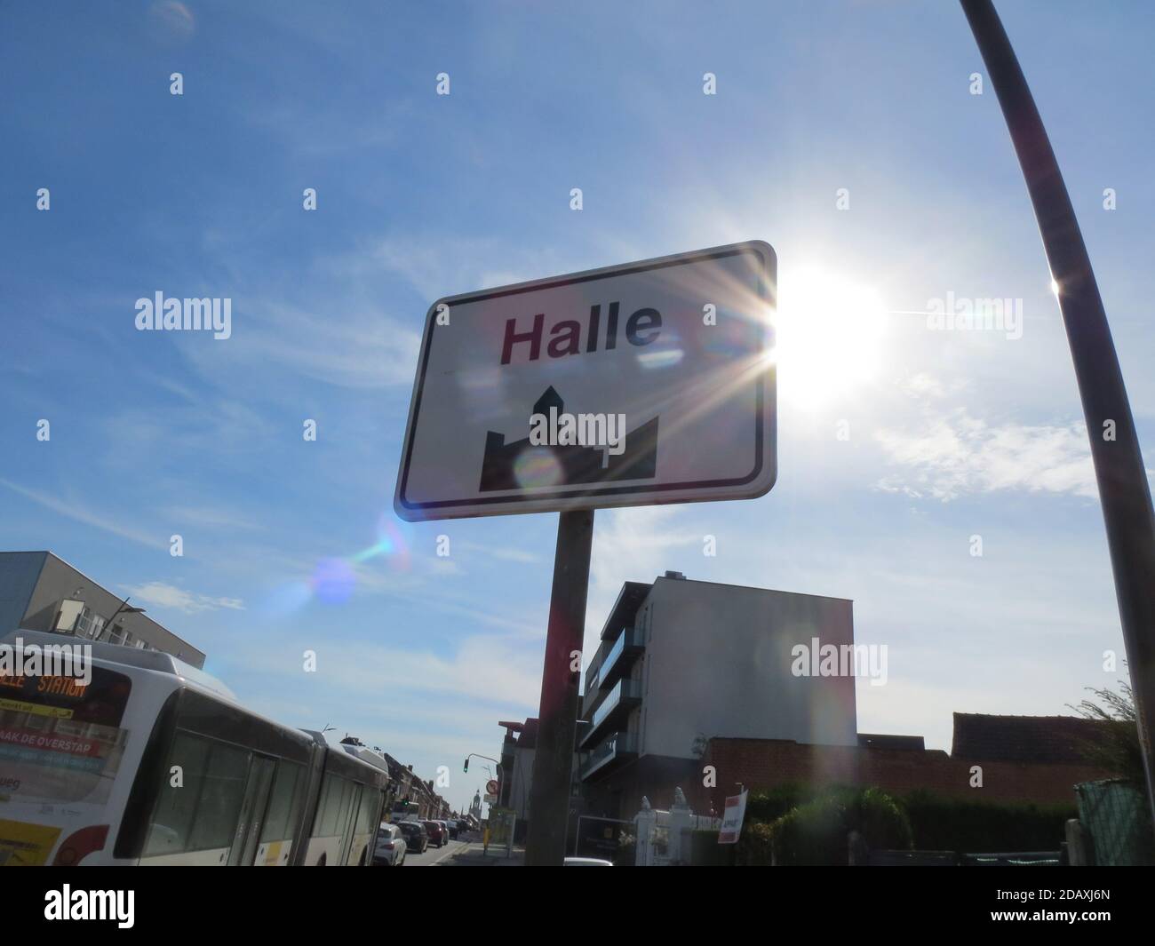 Illustration shows the name of the Halle municipality on a road sign ...