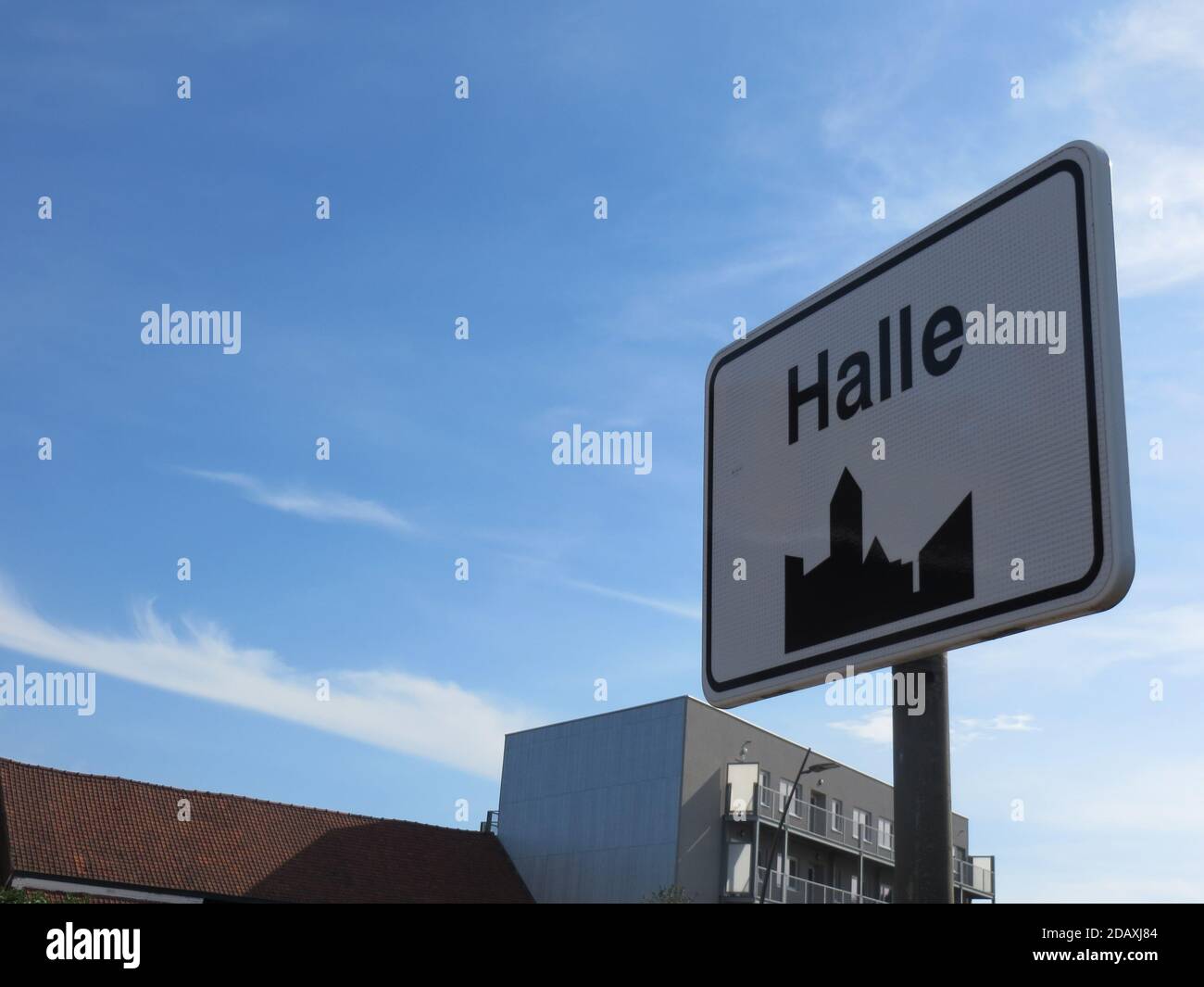 Illustration shows the name of the Halle municipality on a road sign ...