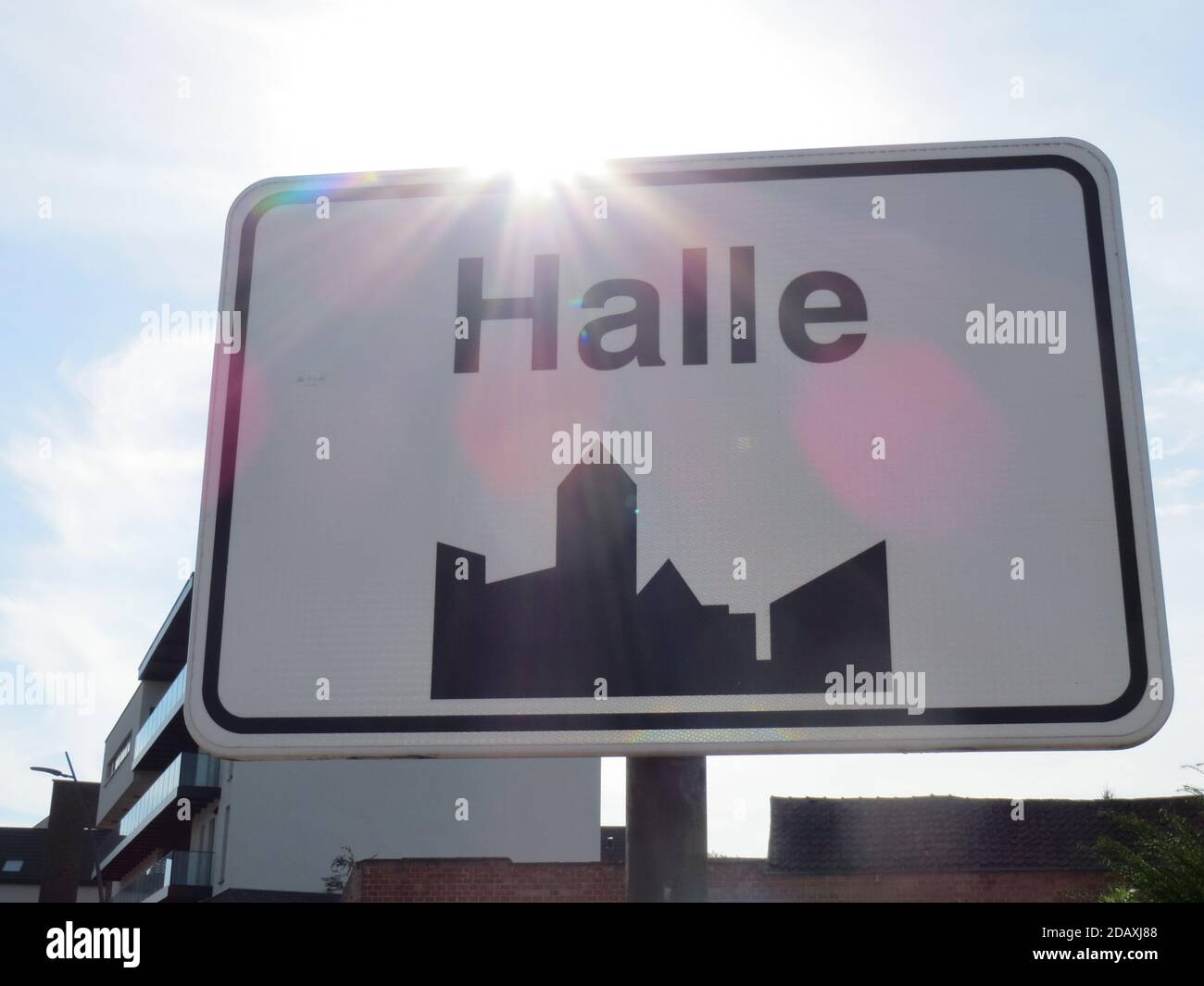Illustration shows the name of the Halle municipality on a road sign ...