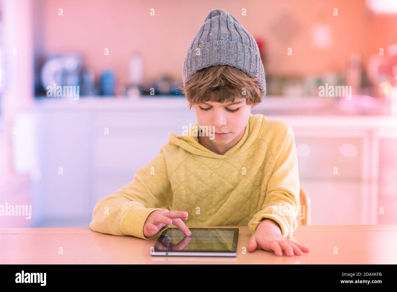 Little boy using digital tablet Stock Photo - Alamy
