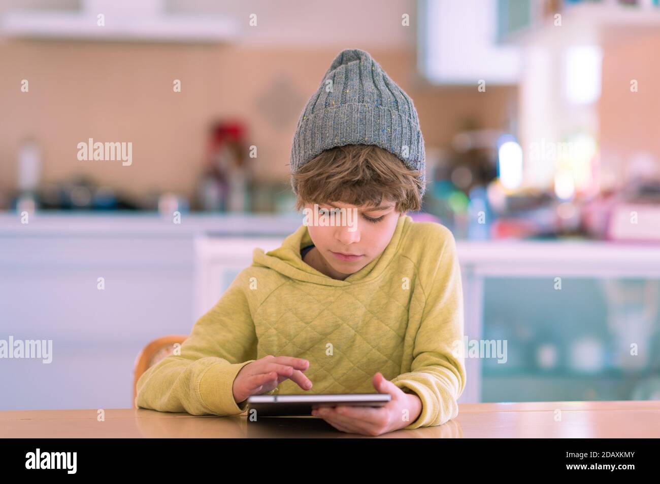 Little boy using digital tablet Stock Photo - Alamy