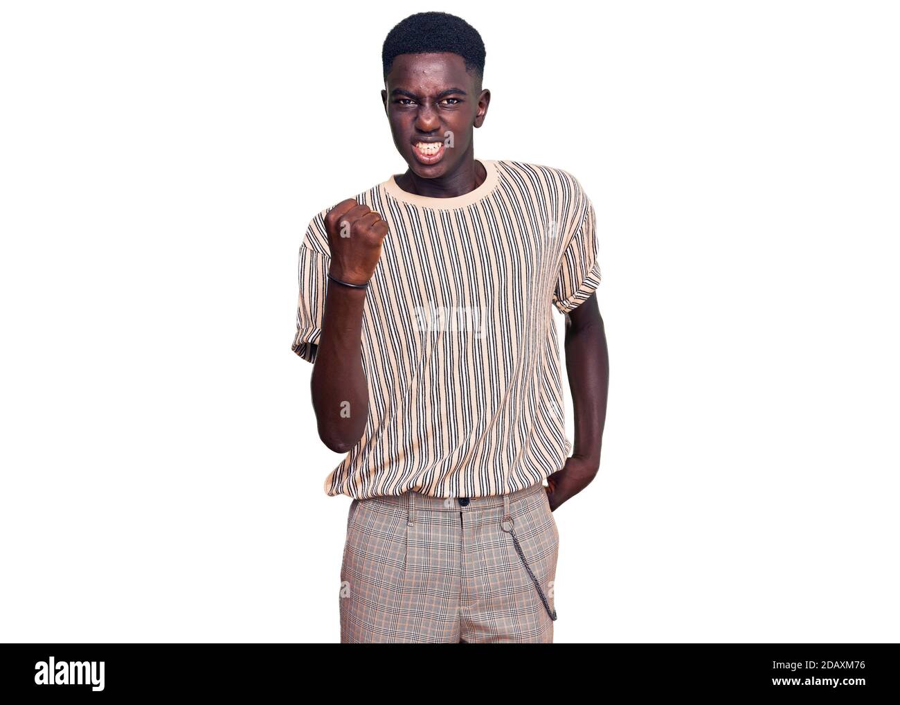 Young african american man wearing casual clothes angry and mad raising ...
