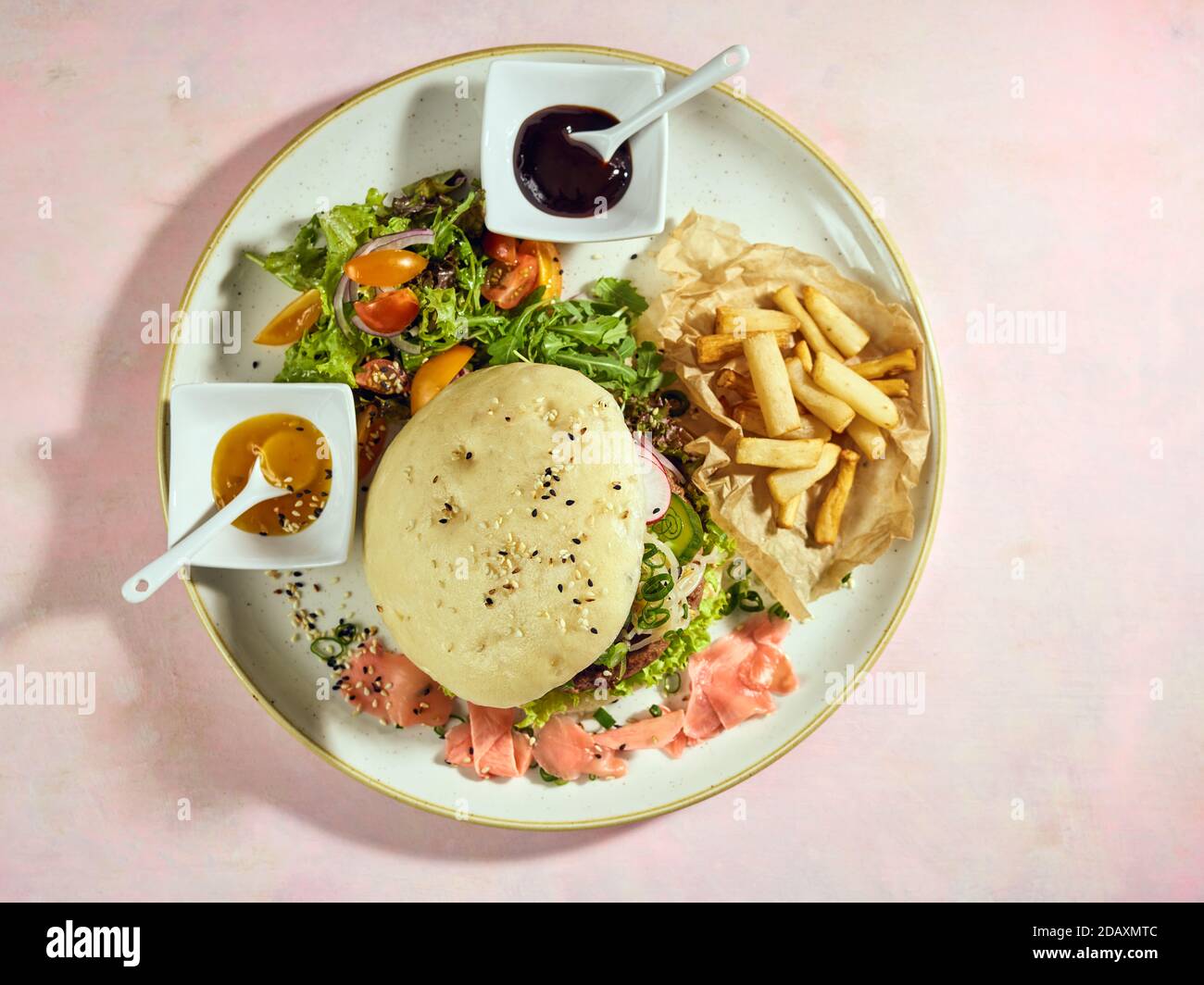 Japanese wagyu beef burger plate with Japanese fries and greens. Gohan ...
