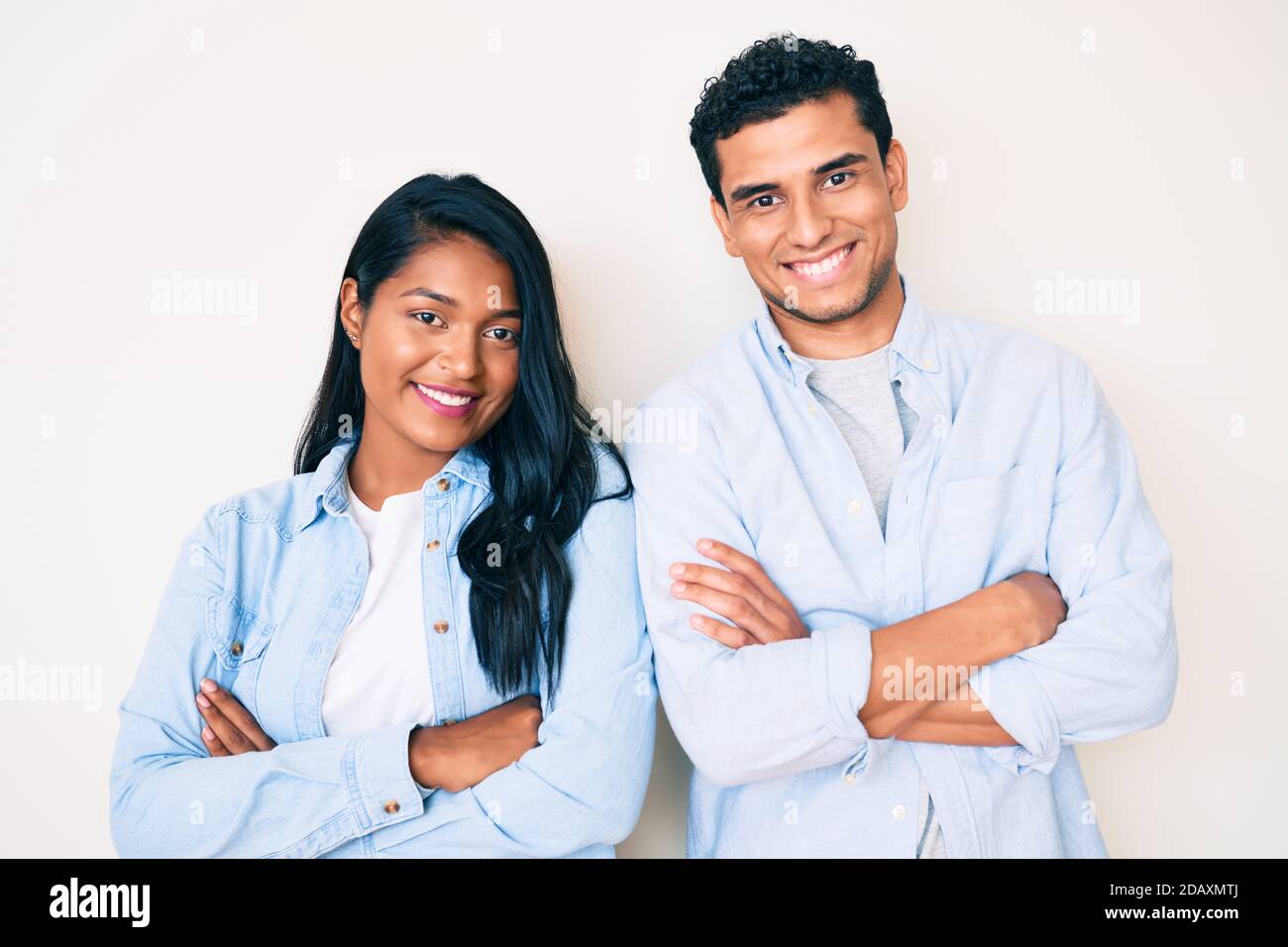 Beautiful latin young couple wearing casual clothes happy face smiling ...