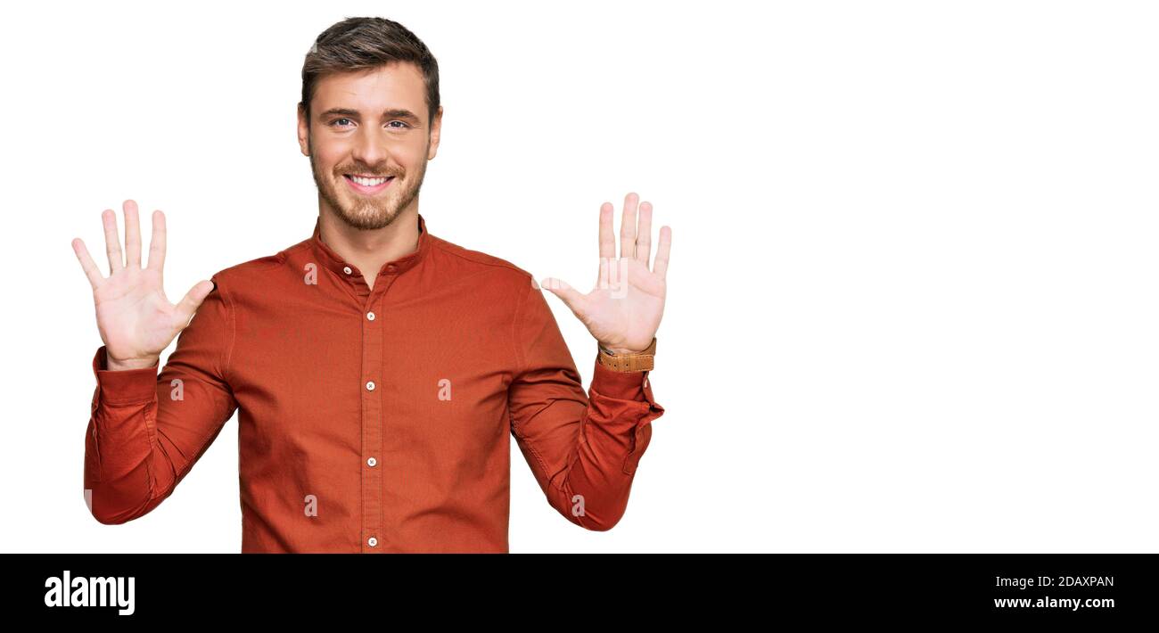 Handsome caucasian man wearing casual clothes showing and pointing up ...
