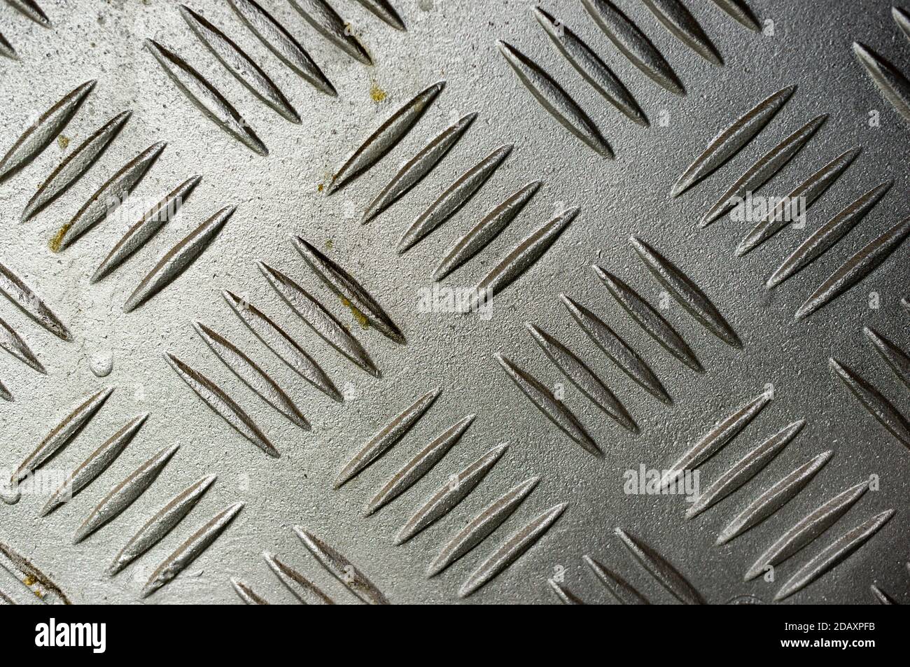 Closeup of a metal diamond plate texture Stock Photo - Alamy