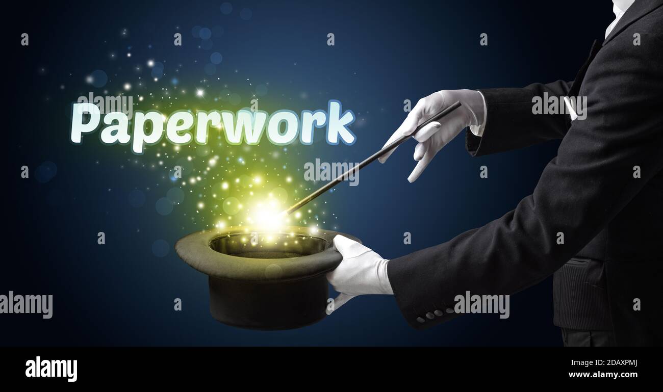 Magician is showing magic trick with Paperwork inscription, educational concept Stock Photo - Alamy