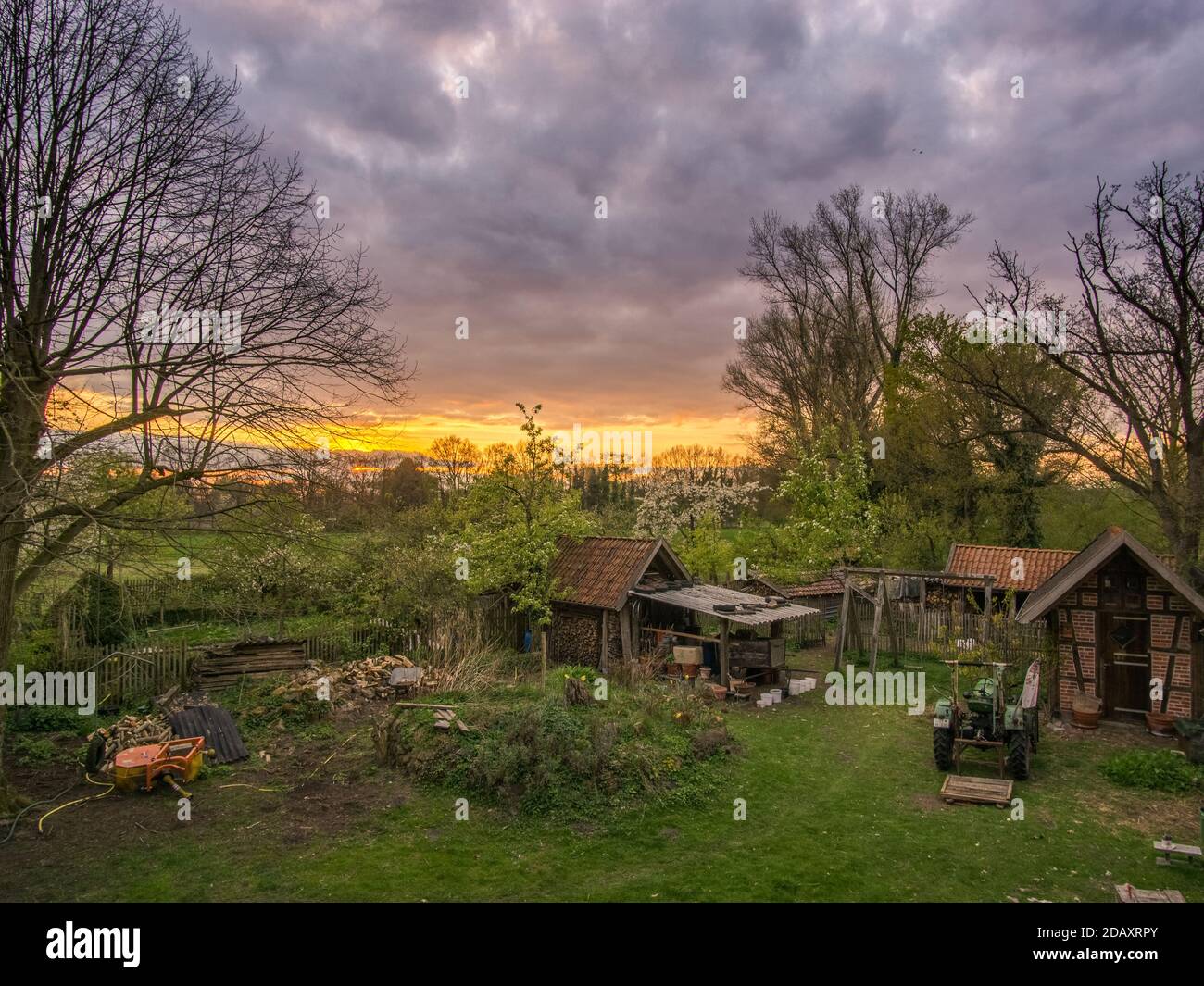 Beautiful farm with brick and truss buildings at evening Stock Photo ...