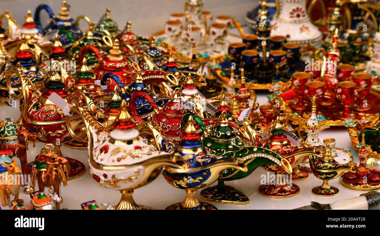 Eastern pitchers stand on a shelf Stock Photo - Alamy
