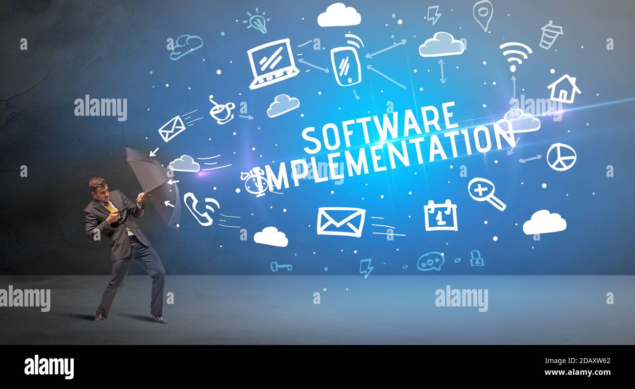 Businessman defending with umbrella from SOFTWARE IMPLEMENTATION ...