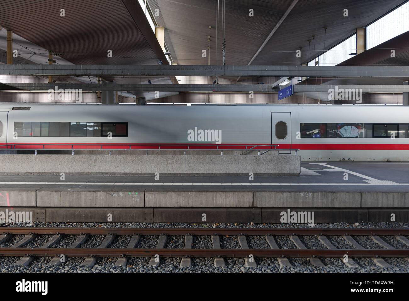 Horizontal interior view of platform railway train station and white ...