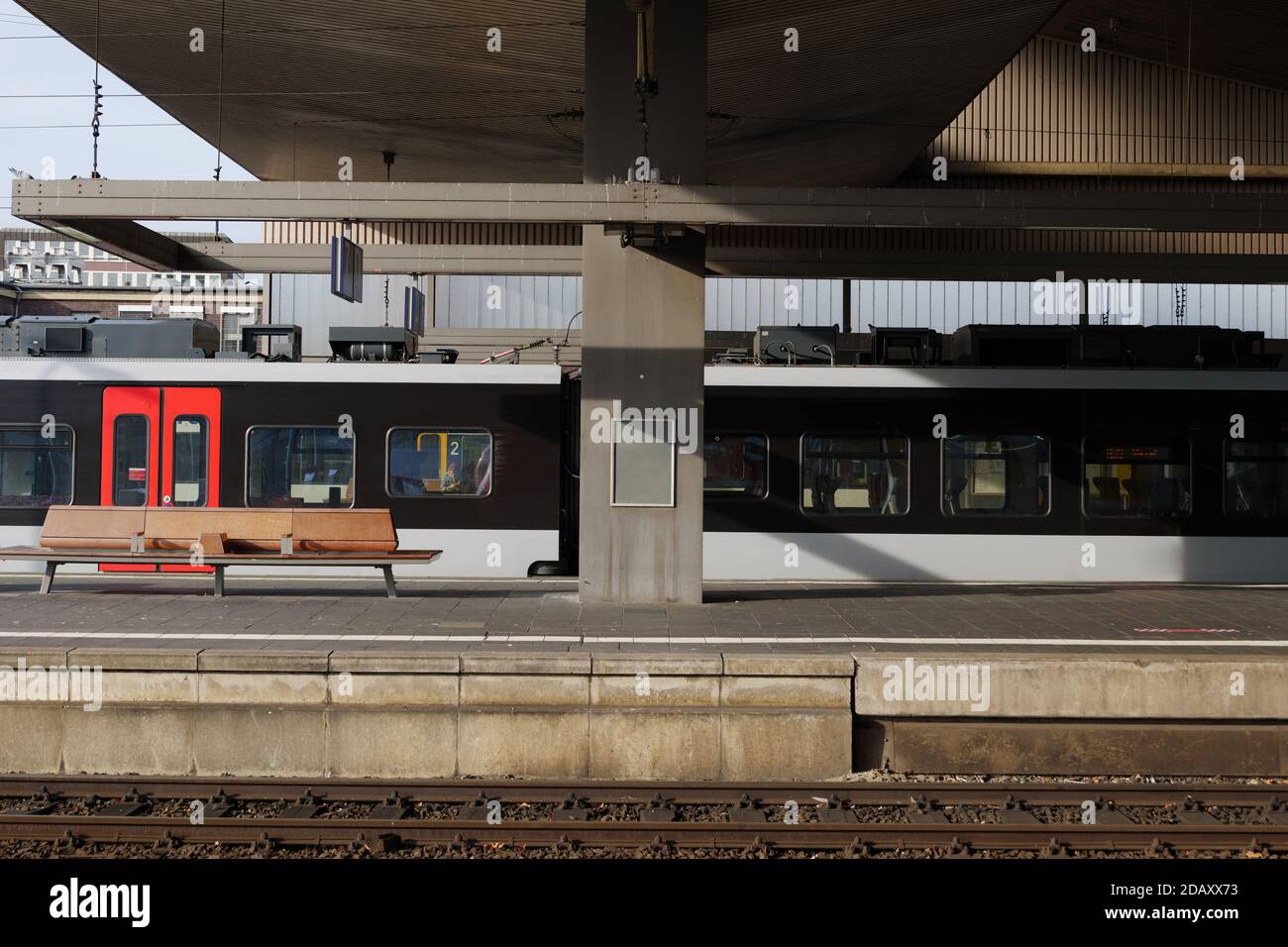 Horizontal interior view of platform railway train station and white ...