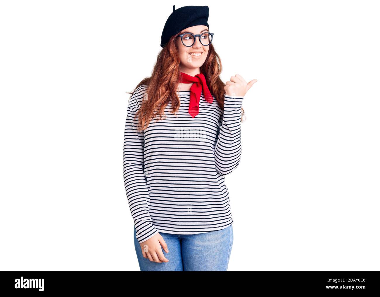Young beautiful woman wearing french look with beret smiling with happy ...