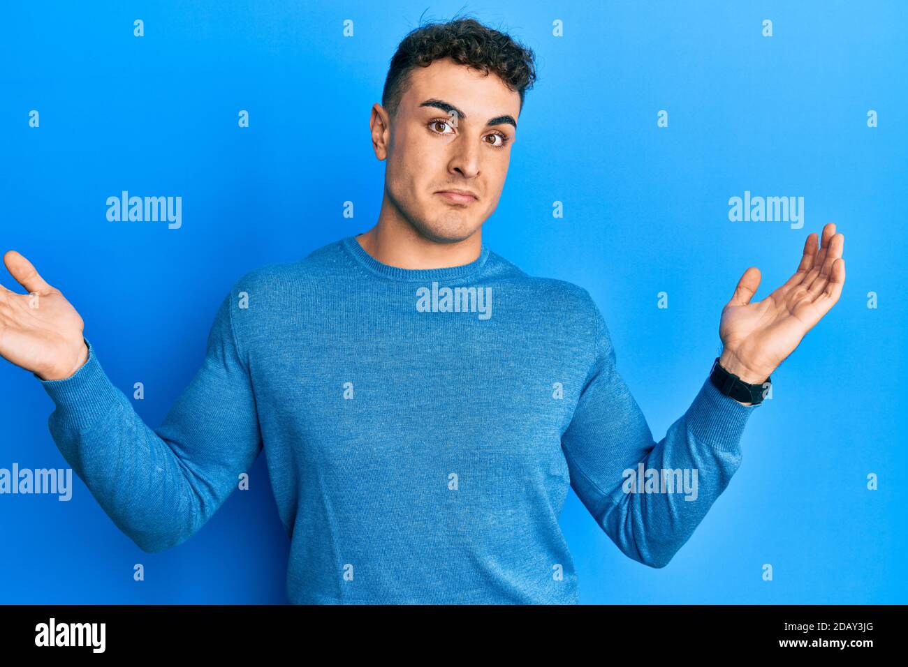 Handsome young man wearing casual clothes angry and mad screaming ...