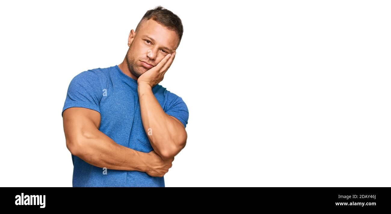 Handsome muscle man wearing casual clothes thinking looking tired and ...