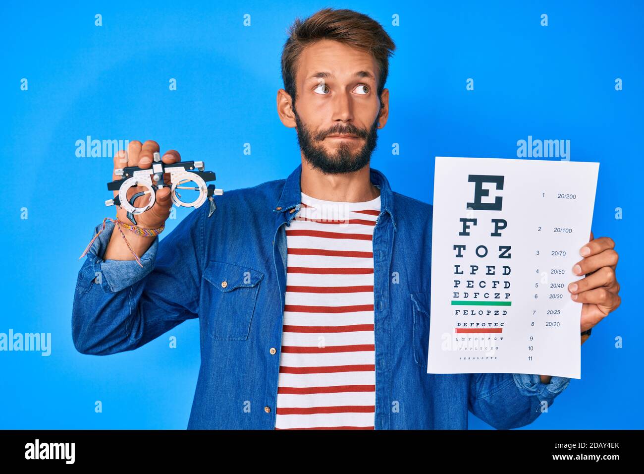 Man staring at eye chart hi-res stock photography and images - Alamy