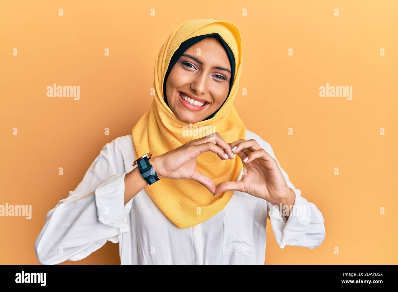 Young brunette arab woman wearing traditional islamic hijab scarf ...